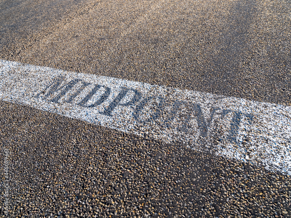 Midpoint sign painted on the Route 66 pavement at the halfway point ...