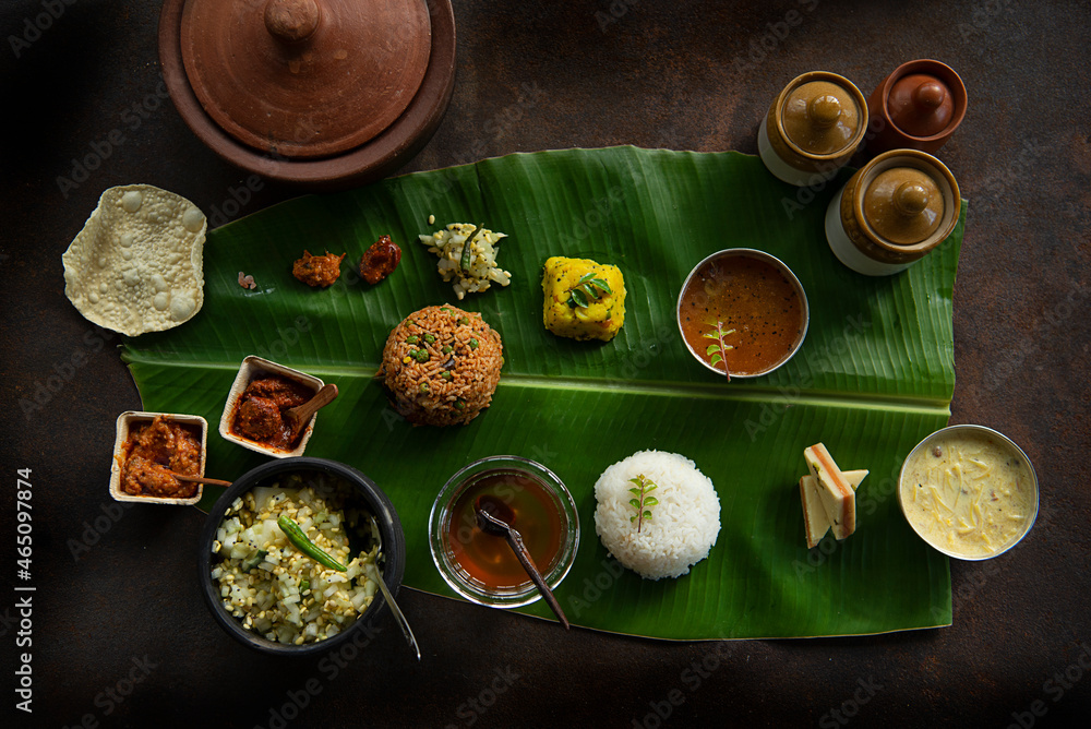 South Indian thali on a banana leaf Stock Photo | Adobe Stock