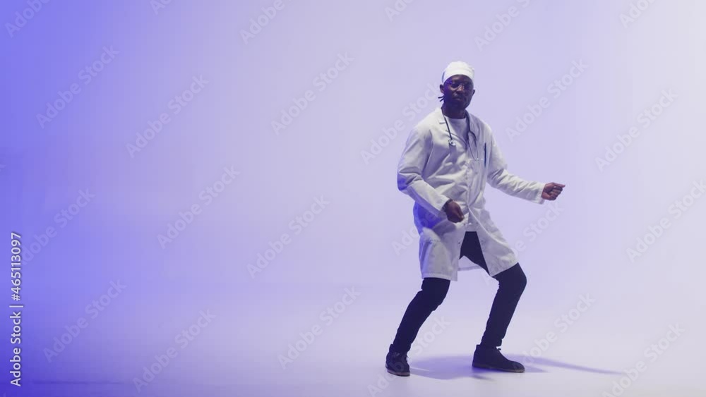 African american happy doctor dancing. Health staff worker having fun ...