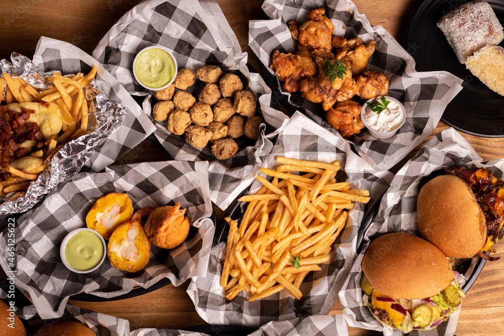 Finger Food Servings - Buffalo Wings, French Fries and Meat Dumpling ...
