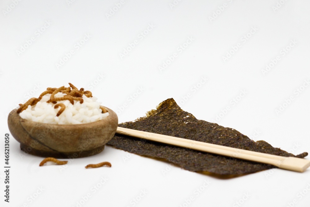 Healthy worms in white rice. Food of the future. The earthworms and ...