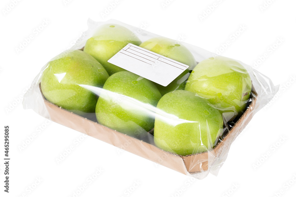 Packed and labeled green apple on isolated white background Stock Photo ...