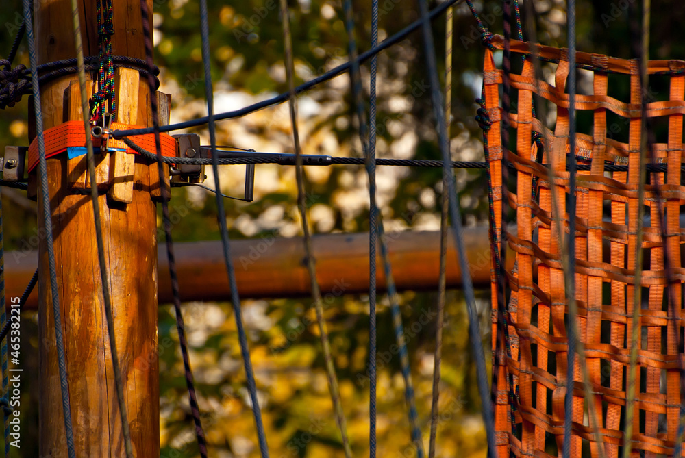 Rope park for children. Extreme outdoor entertainment. Slings, ropes ...