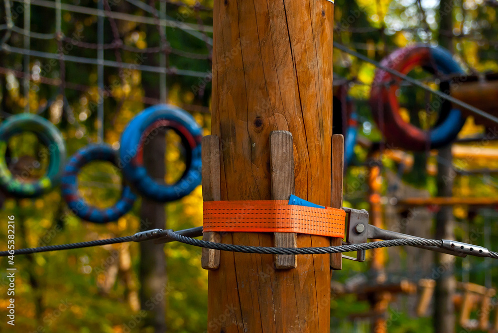 Rope park for children. Extreme outdoor entertainment. Slings, ropes ...
