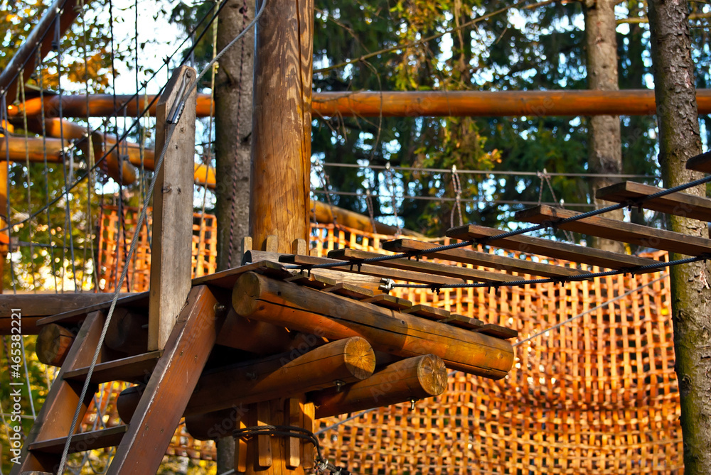 Rope park for children. Extreme outdoor entertainment. Slings, ropes ...