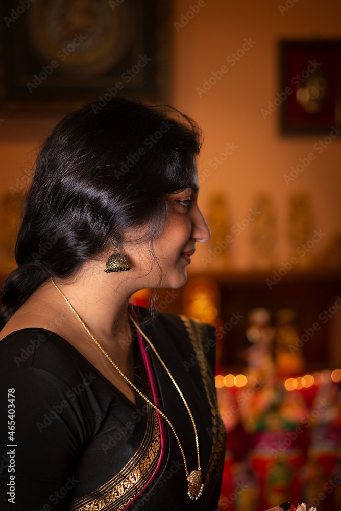Young girl side pose in sari Stock Photo | Adobe Stock