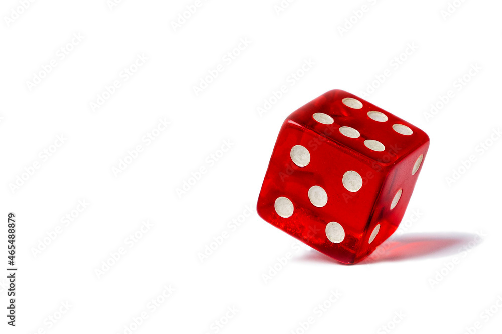 Red dice standing in equilibrium on the edge and showing 6 isolated on ...