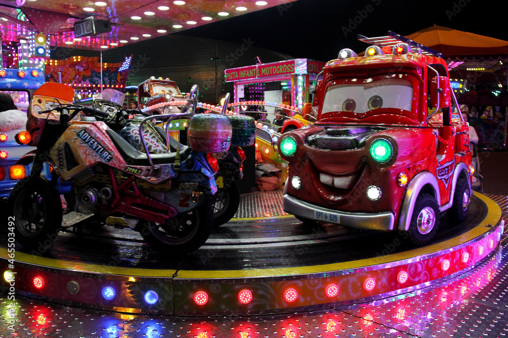 Carousel cars ride in a carnival in Portugal. Stock Photo | Adobe Stock