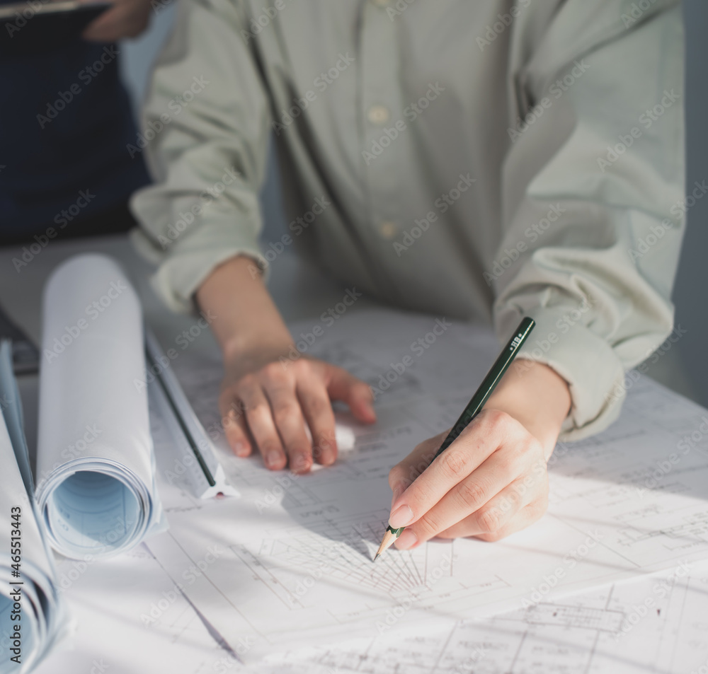 Architect working on blueprint. Architects workplace - architectural ...