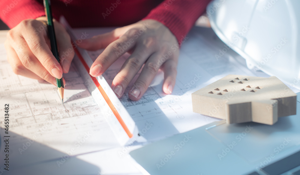 Architect working on blueprint. Architects workplace - architectural ...