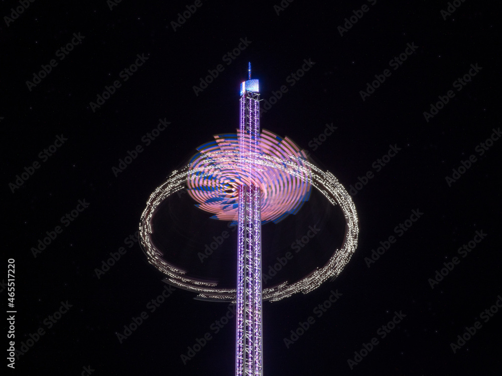 Tower Swinger Ride In Amusement Park at night at anual funfair Stock ...