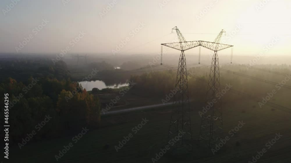 AERIAL VIEW, LENS FLARE: anchor support of a high-voltage power line ...