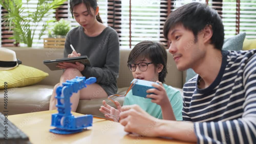 study robot automation at home concept,asian boy child with father mom ...
