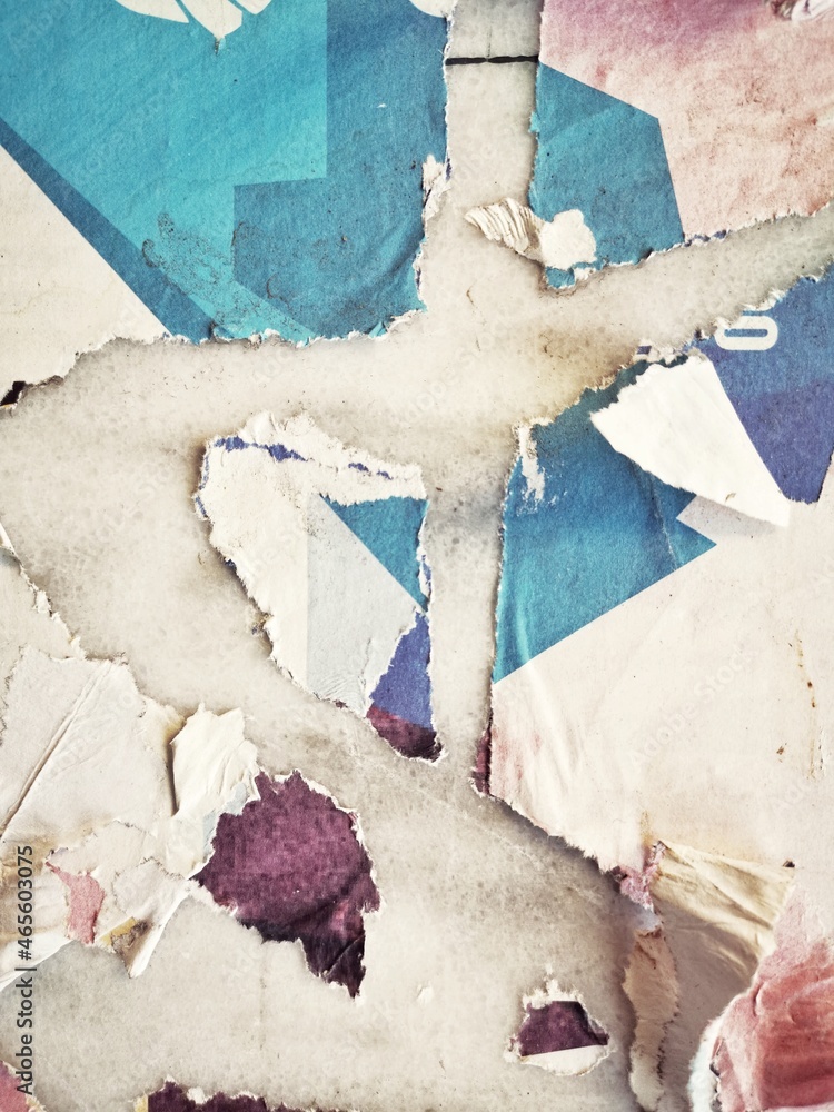 Old grunge ripped, torn vintage posters creased crumpled paper surface ...