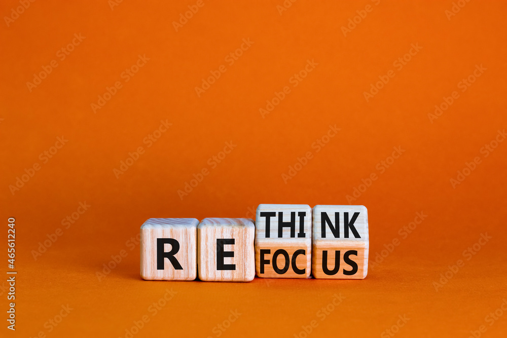Refocus and rethink symbol. Businessman turned cubes and changed the ...