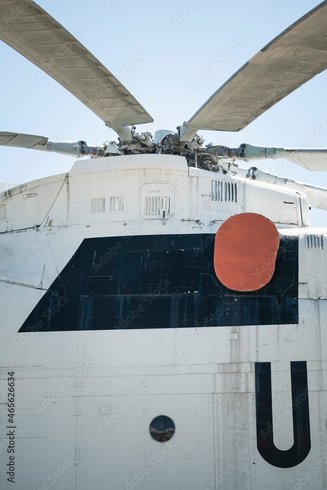Old helicopter. Hull, chassis and propellers of an old helicopter ...