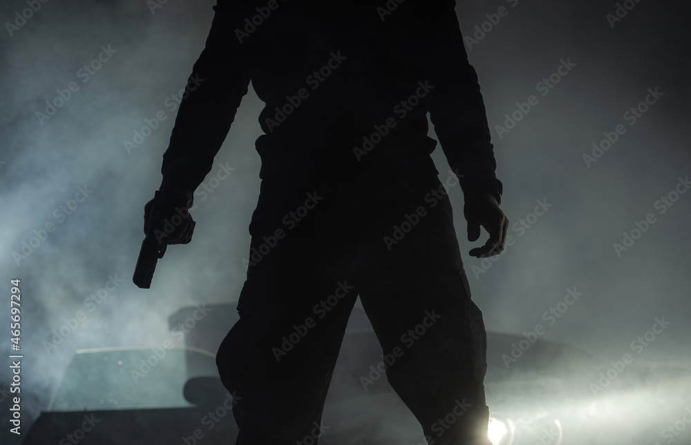 Men with Gun Committing Crime Stock Photo | Adobe Stock