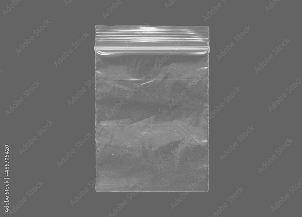 Transparent plastic zip lock bag isolated on a dark background. 3d ...