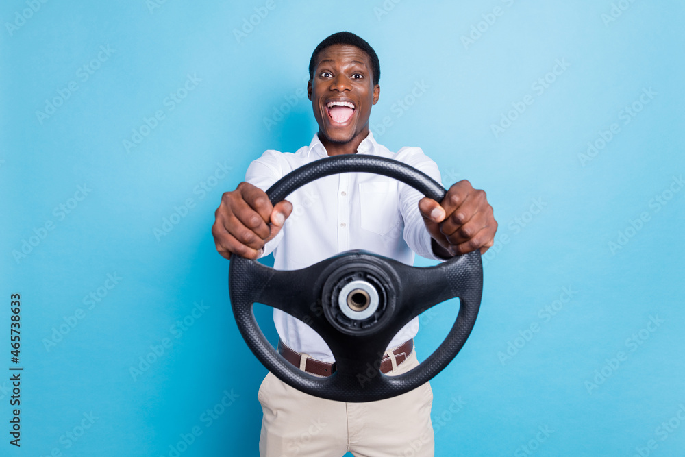 Photo of impressed sweet dark skin man wear white shirt smiling holding ...