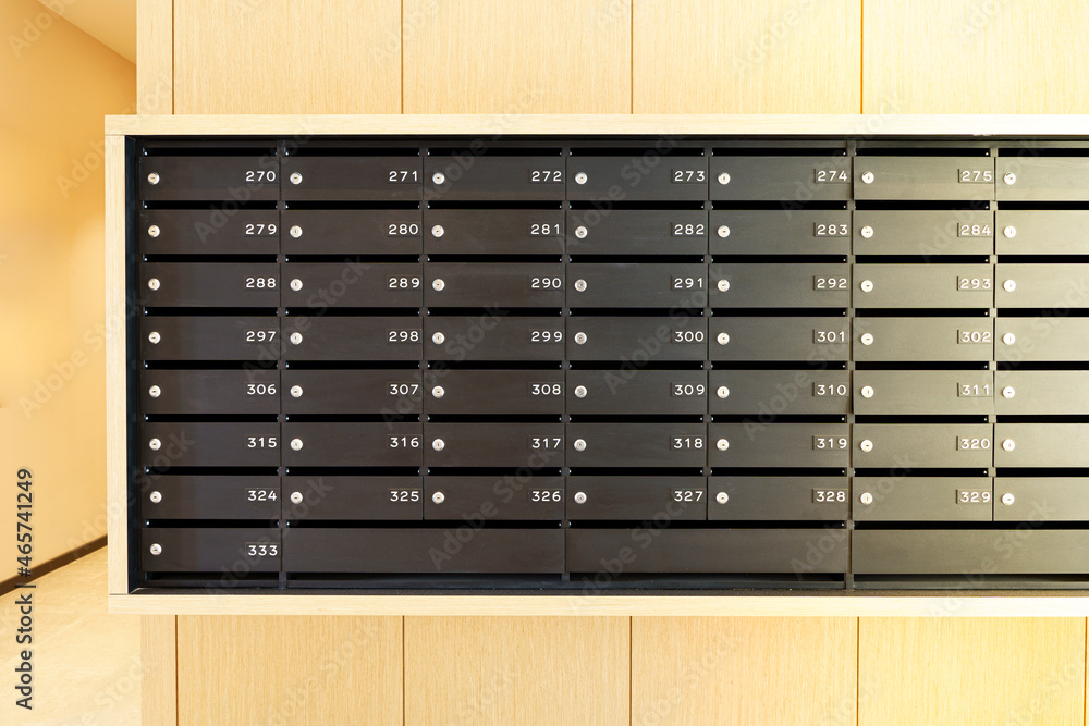 Mailboxes for letters and correspondence. Modern black mailboxes with ...
