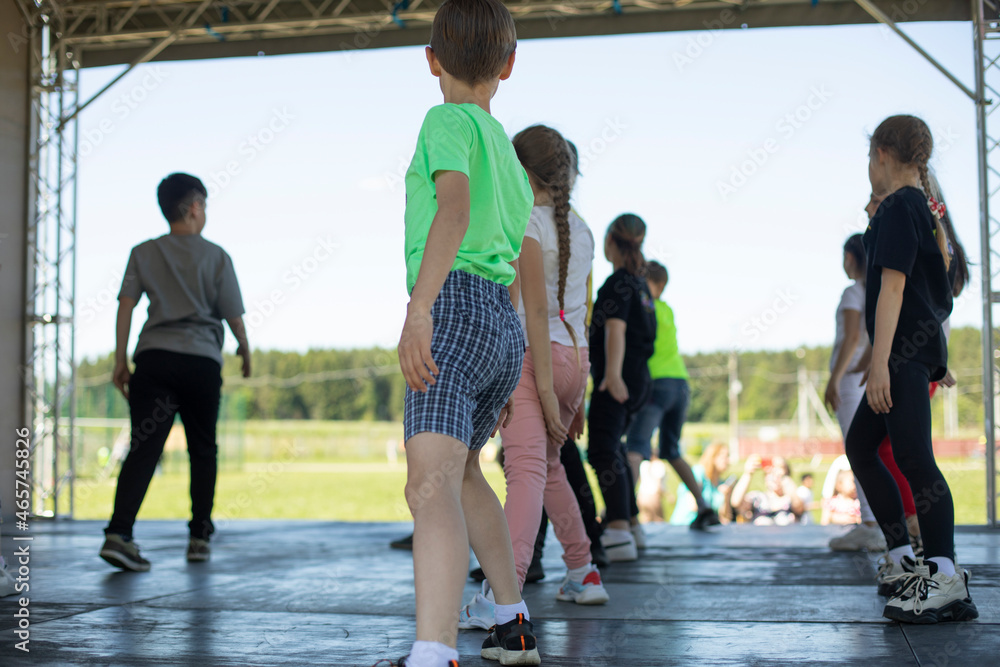 Children on stage. Dance lesson.Children of junior classes. School ...