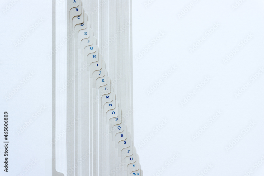 paper dividers with tabs in descending alphabetical order Stock Photo ...