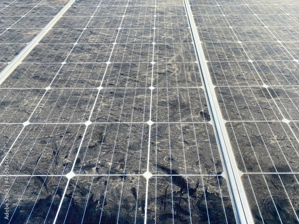 Blue modern energy saving dusty solar panel to generate electricity ...
