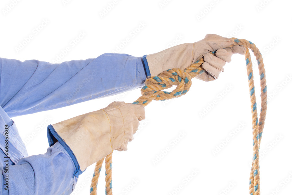 Two hands tying a simple knot to a rope, isolated on white background ...
