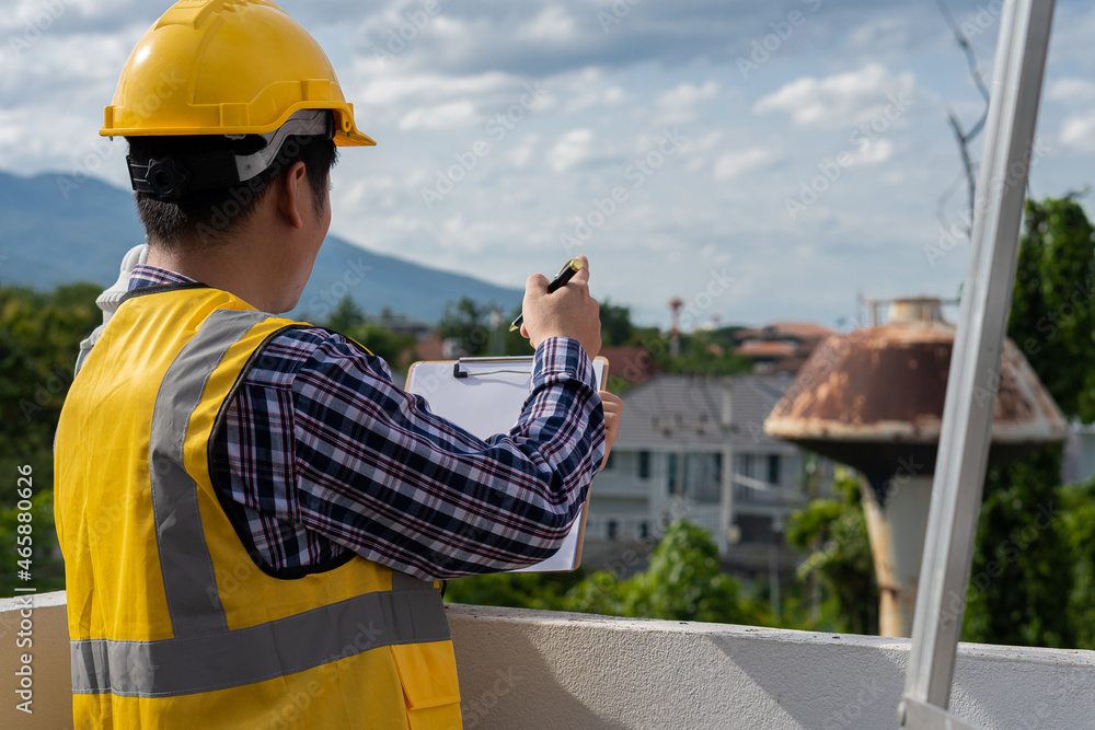 Professional engineers, architects, workers wearing helmets and ...