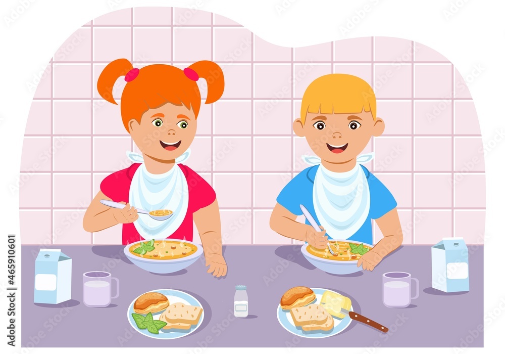 Children, a boy and a girl, eating soup from their plates. Healthy ...