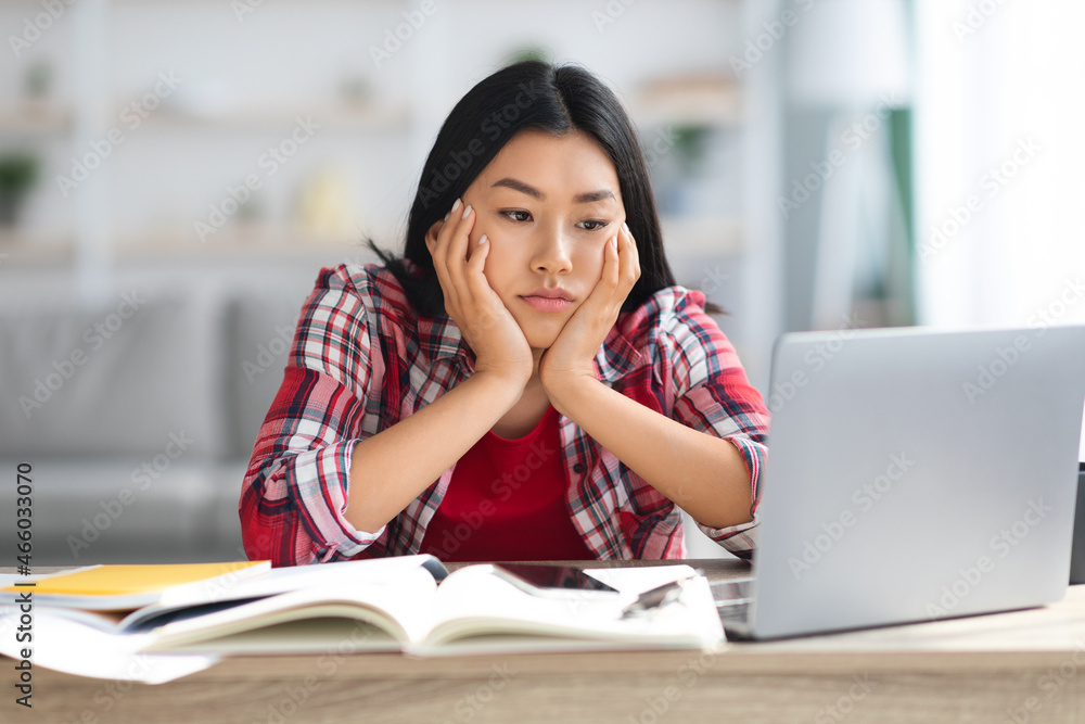 Online Education Problems. Tired Young Asian Student Lady Looking At ...