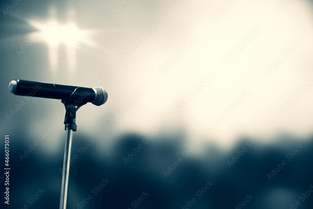 Microphone Public speaking background, Hand is holding microphone on ...