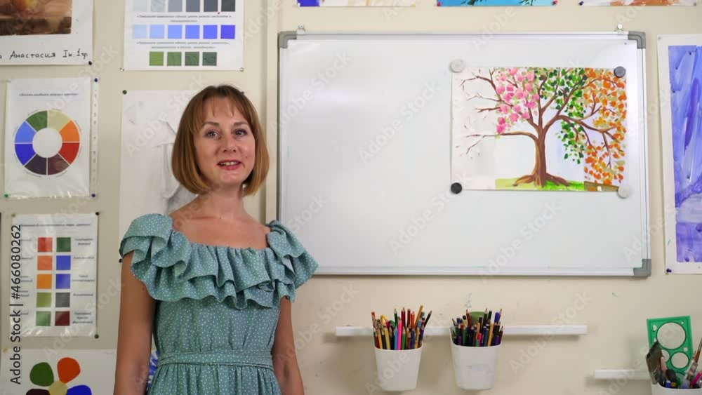 Artist woman talk about drawing Spbas. Blogger stand with whiteboard ...