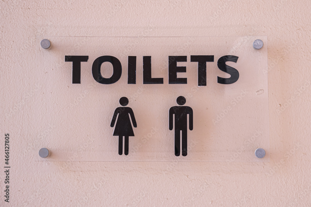 Glass sign with the inscription toilets. Indicative sign for toilet ...