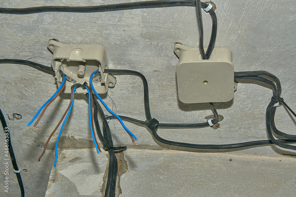 Laying and connection of electrical wires in the external junction box ...