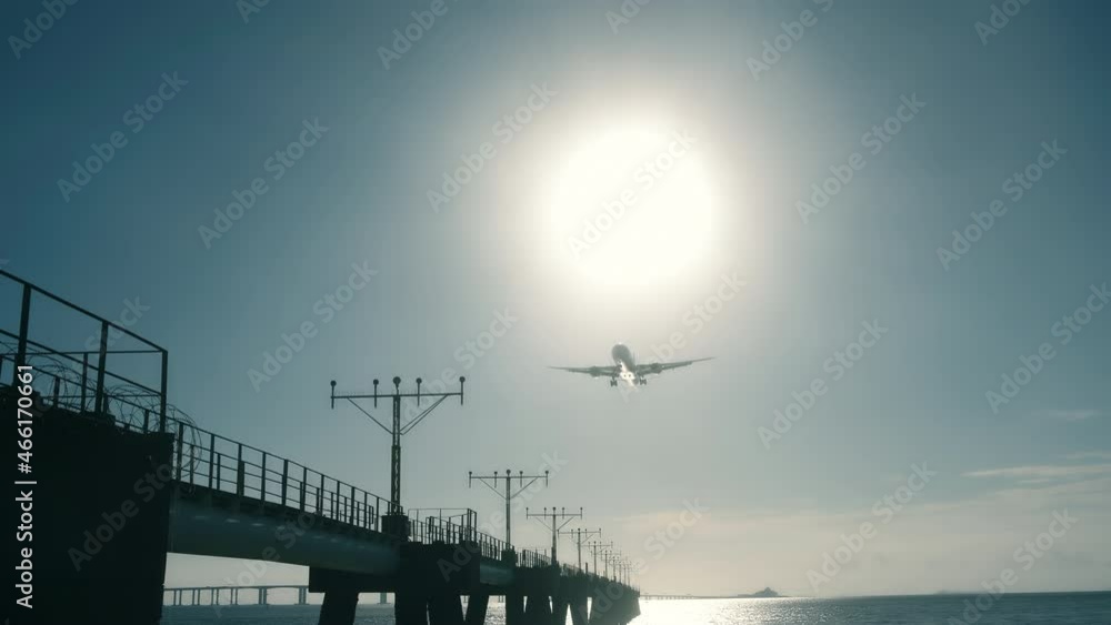 Passenger aircraft arriving and landing at international airport ...