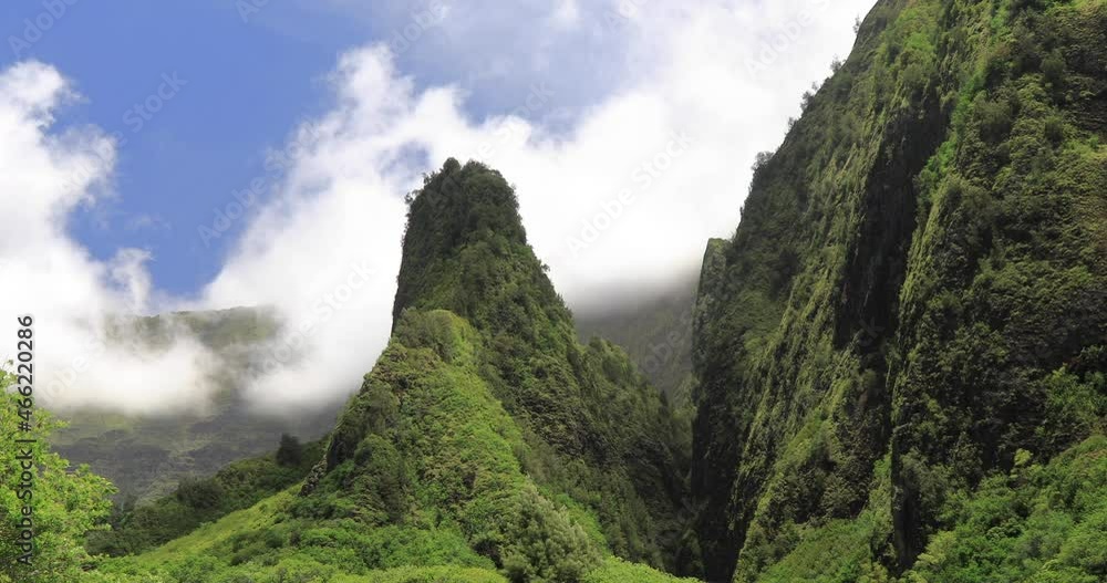 Stationary locked off shot of the Lao Needle which is a famous landmark ...