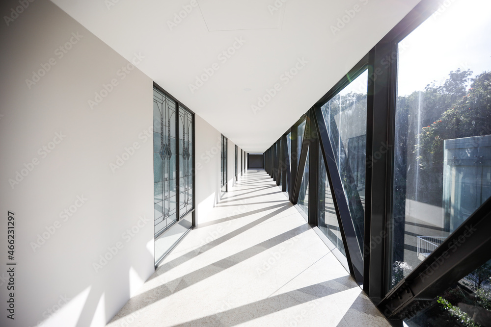 Modern and luxury hotel hallway space building with giant window ...
