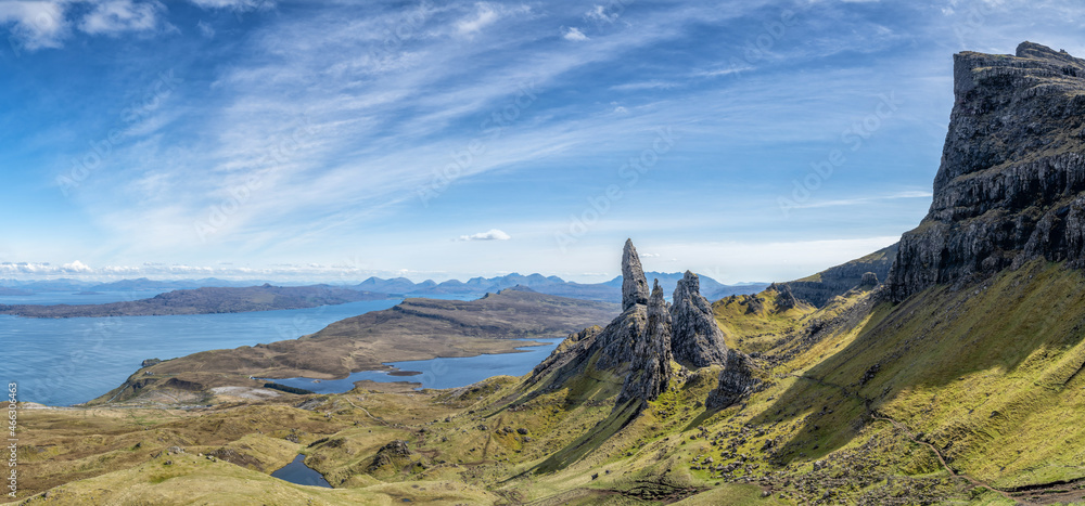 Dramatic Scottish Highlands, blue sky at the Old Man of Storr, tourist ...