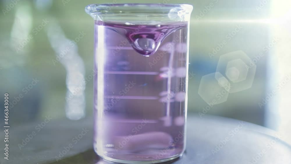 Glass Beaker with Stir Bar on Top of a Magnetic Laboratory Stirrer in a ...