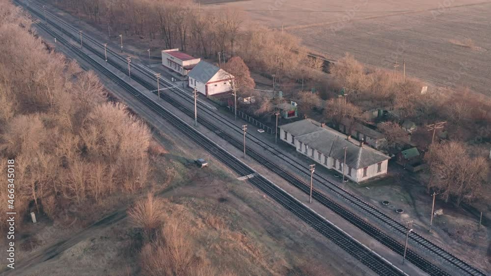Rural Railway Station and Railroad - orbit drone shot. Transit station ...