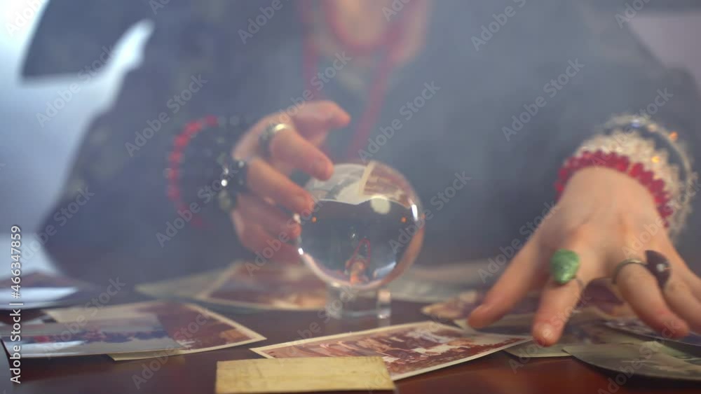 Vídeo do Stock: Generic witch performing mystery ritual using crystal ...