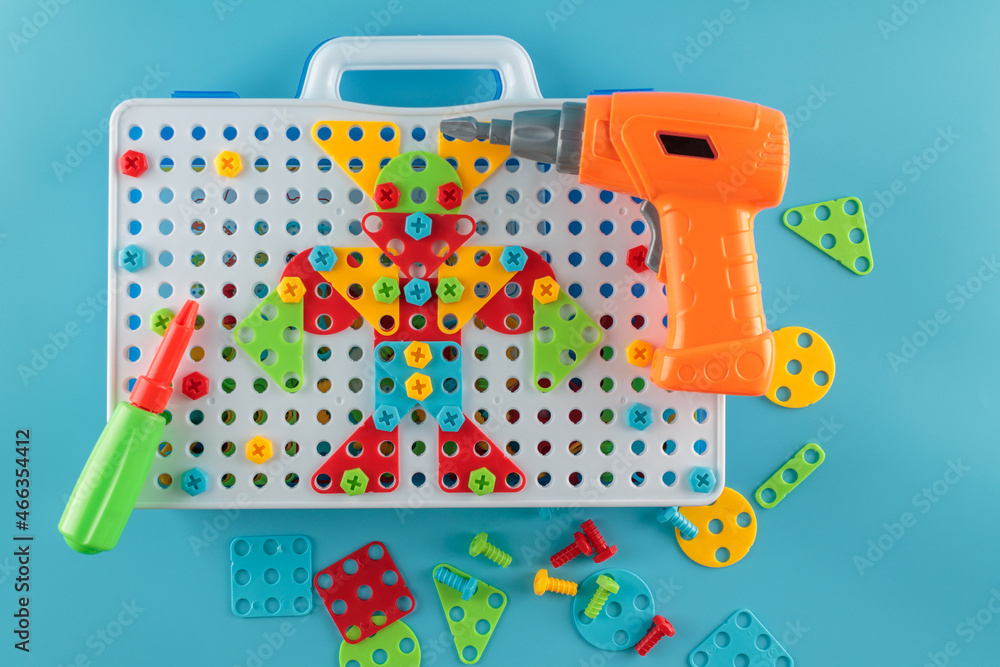designer children's play set with a screwdriver and a drill, a battery ...