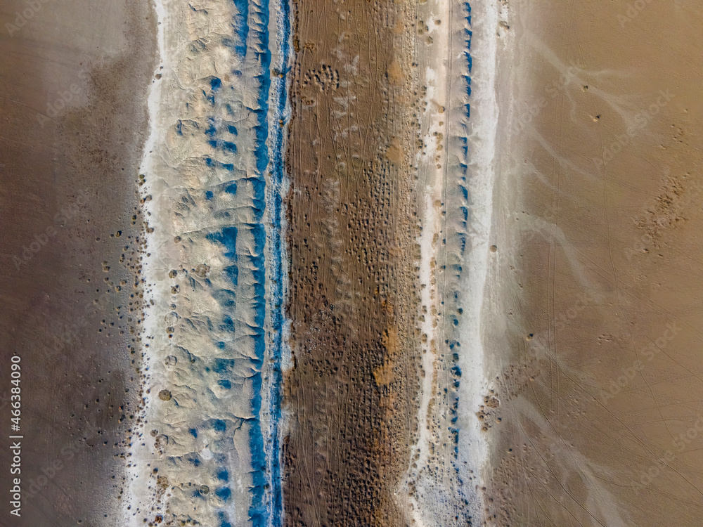Aerial view of a dried-up riverbed as a result of global climate change ...