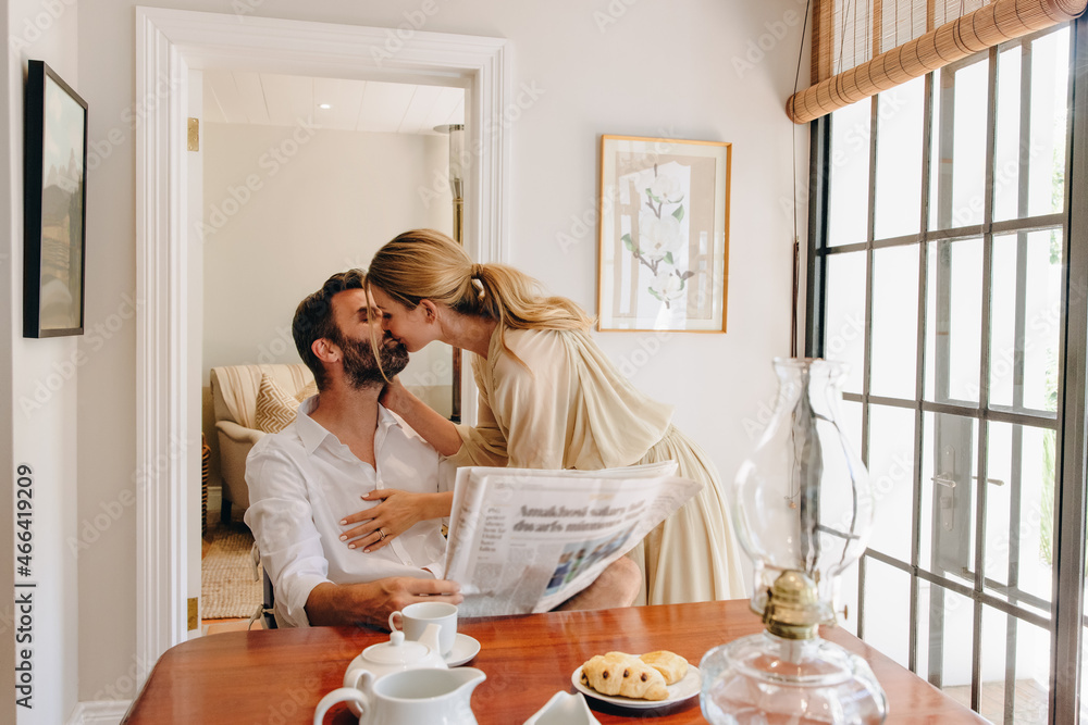 Romantic couple kissing while on vacation Stock Photo | Adobe Stock