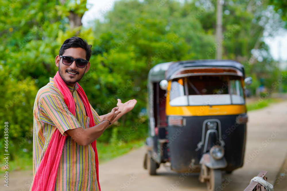 Indian auto rickshaw three-wheeler tuk-tuk taxi driver man. Stock Photo ...