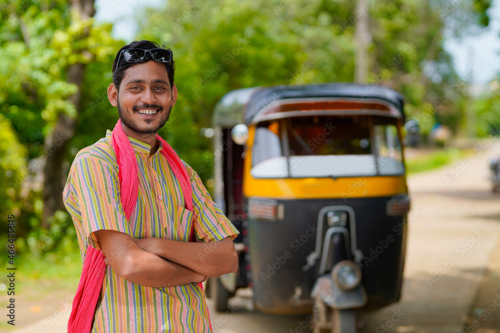 Indian auto rickshaw three-wheeler tuk-tuk taxi driver man. Stock Photo ...