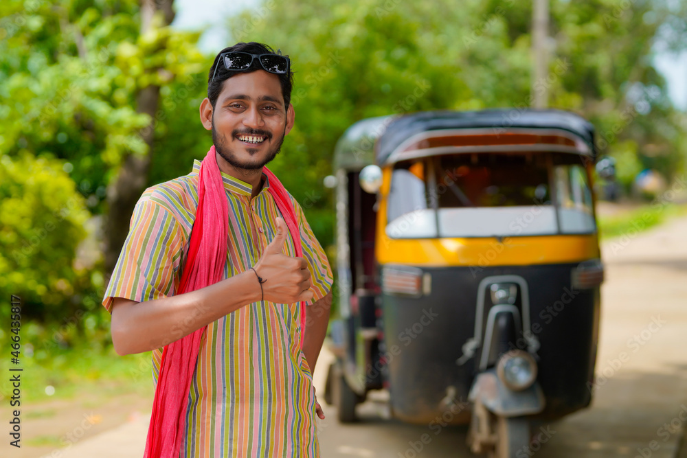 Indian auto rickshaw three-wheeler tuk-tuk taxi driver man. Stock Photo ...