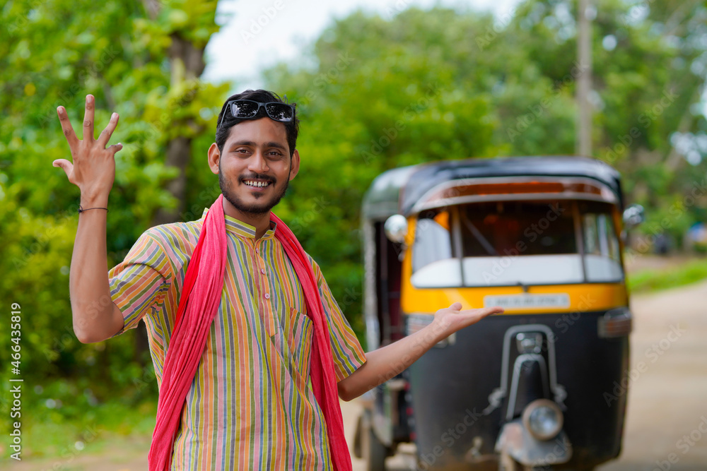 Indian auto rickshaw three-wheeler tuk-tuk taxi driver man. Stock Photo ...