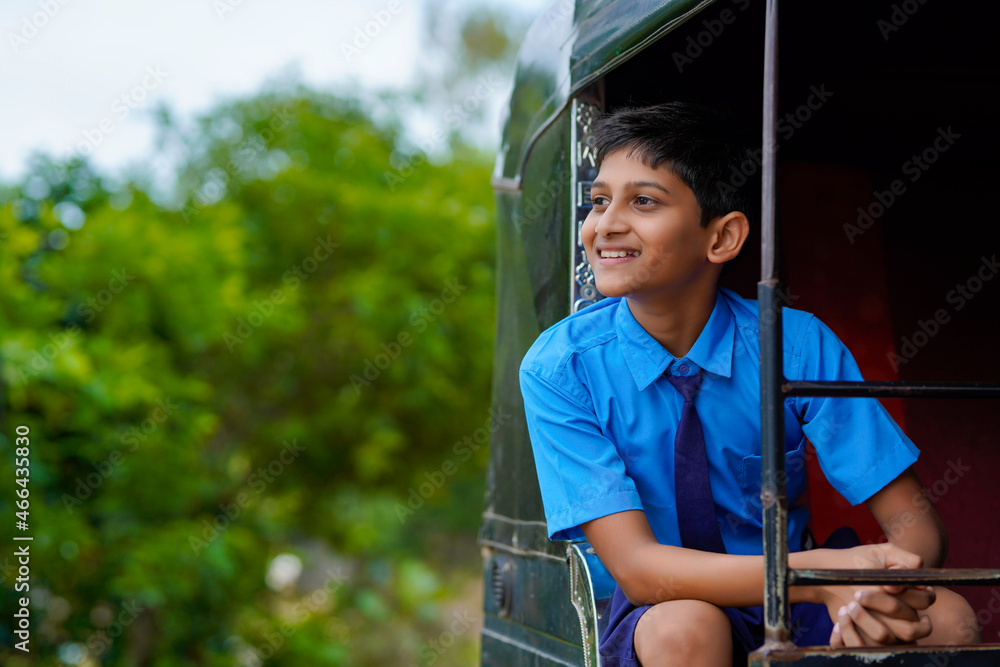 Indian school boy going to school in auto rikshaw Stock Photo | Adobe Stock